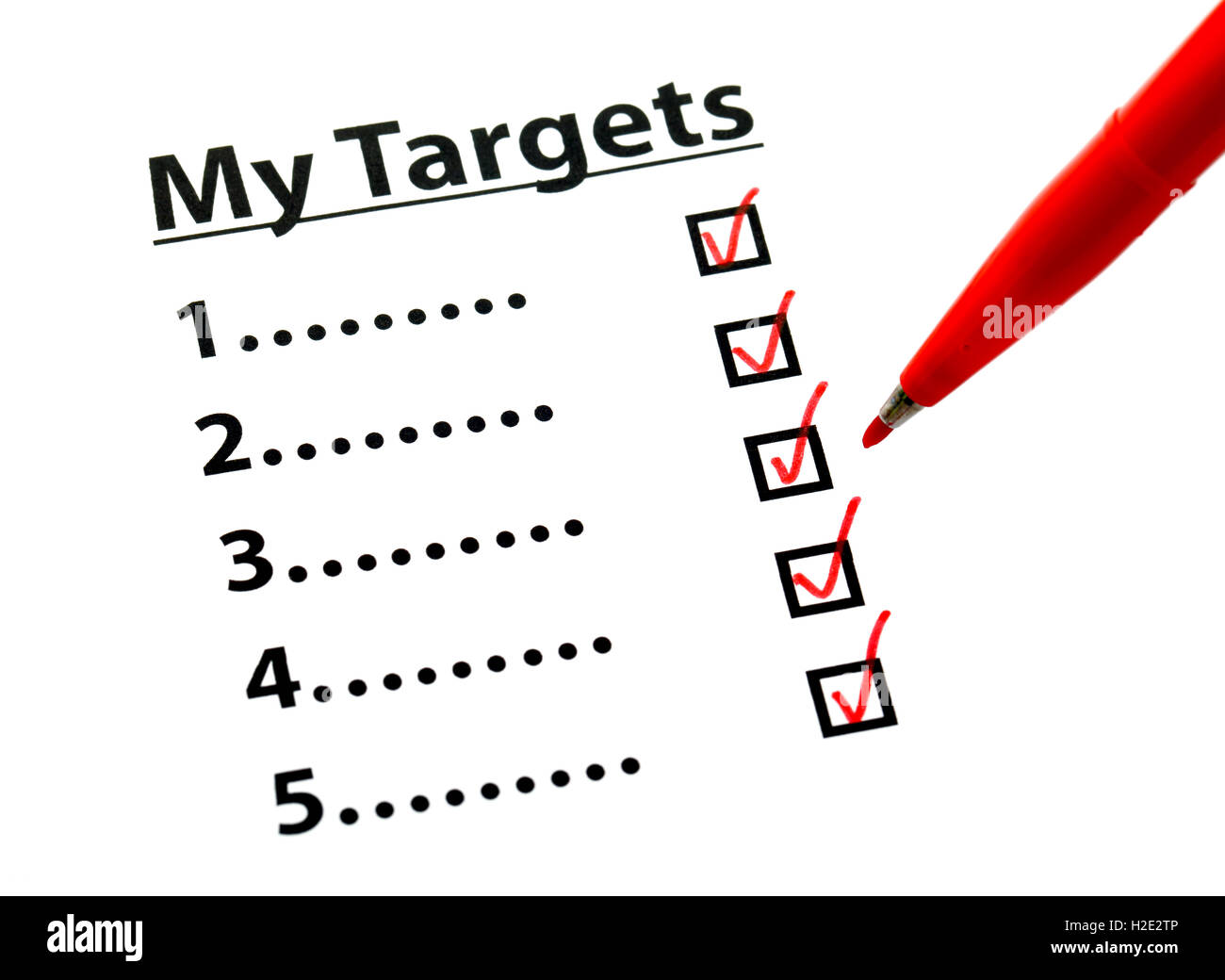 Target list out with tick Stock Photo - Alamy