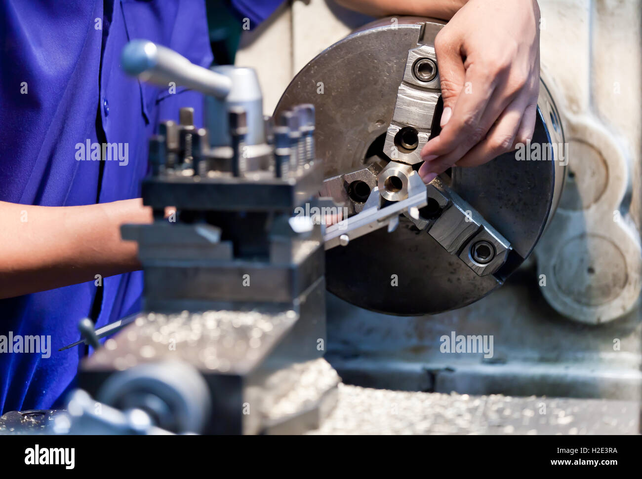 Milling machine operator working in factory workshop Stock Photo - Alamy