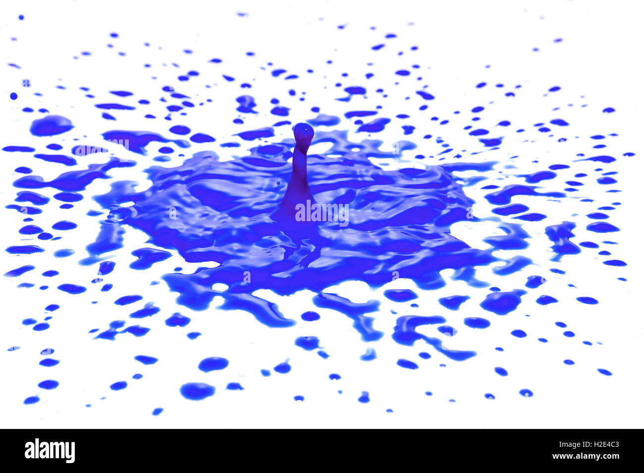 Drop of blue color water after the impact to the blue splash. Other ...