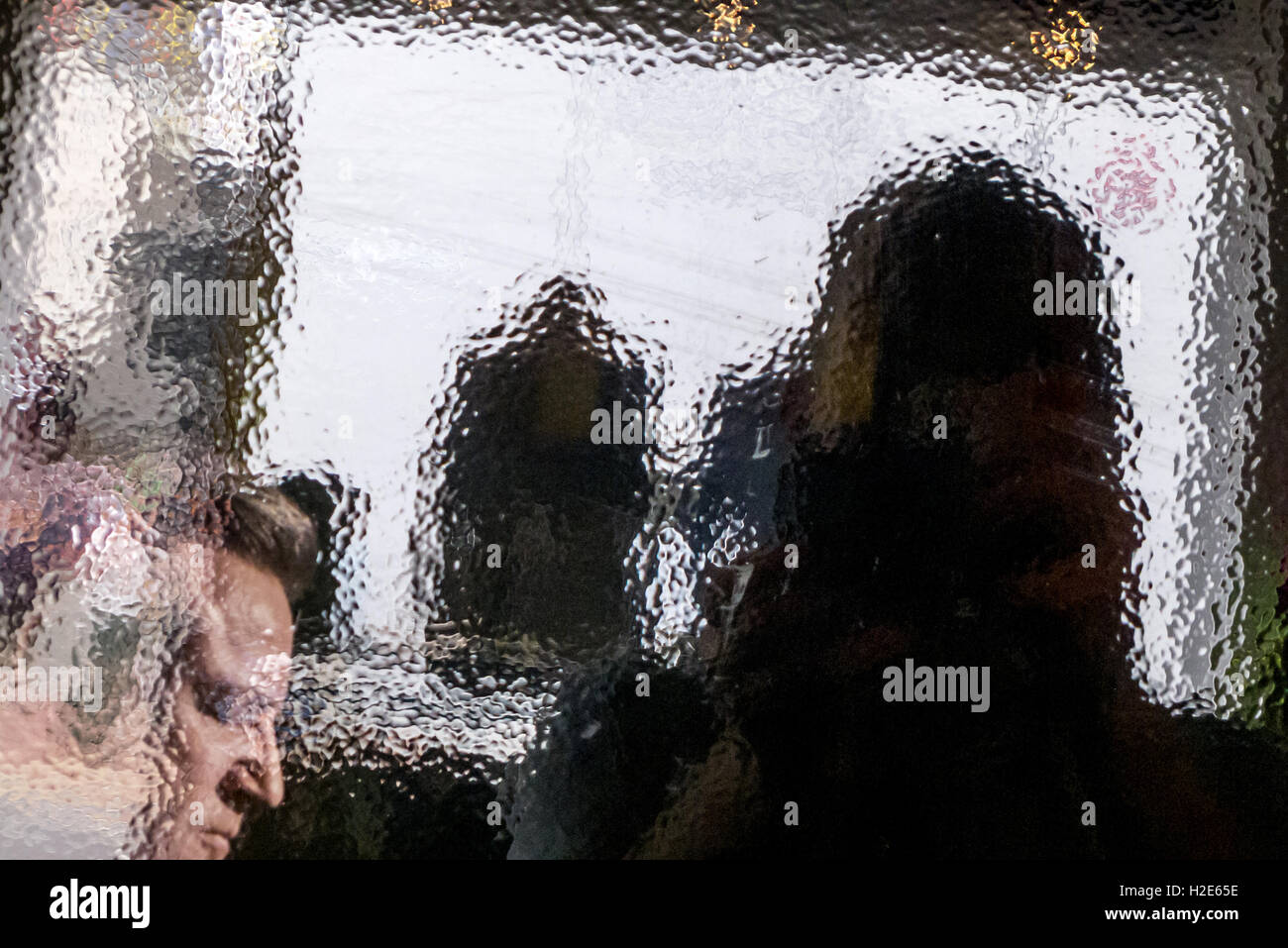 Abstract portrait through frosted glass Stock Photo - Alamy