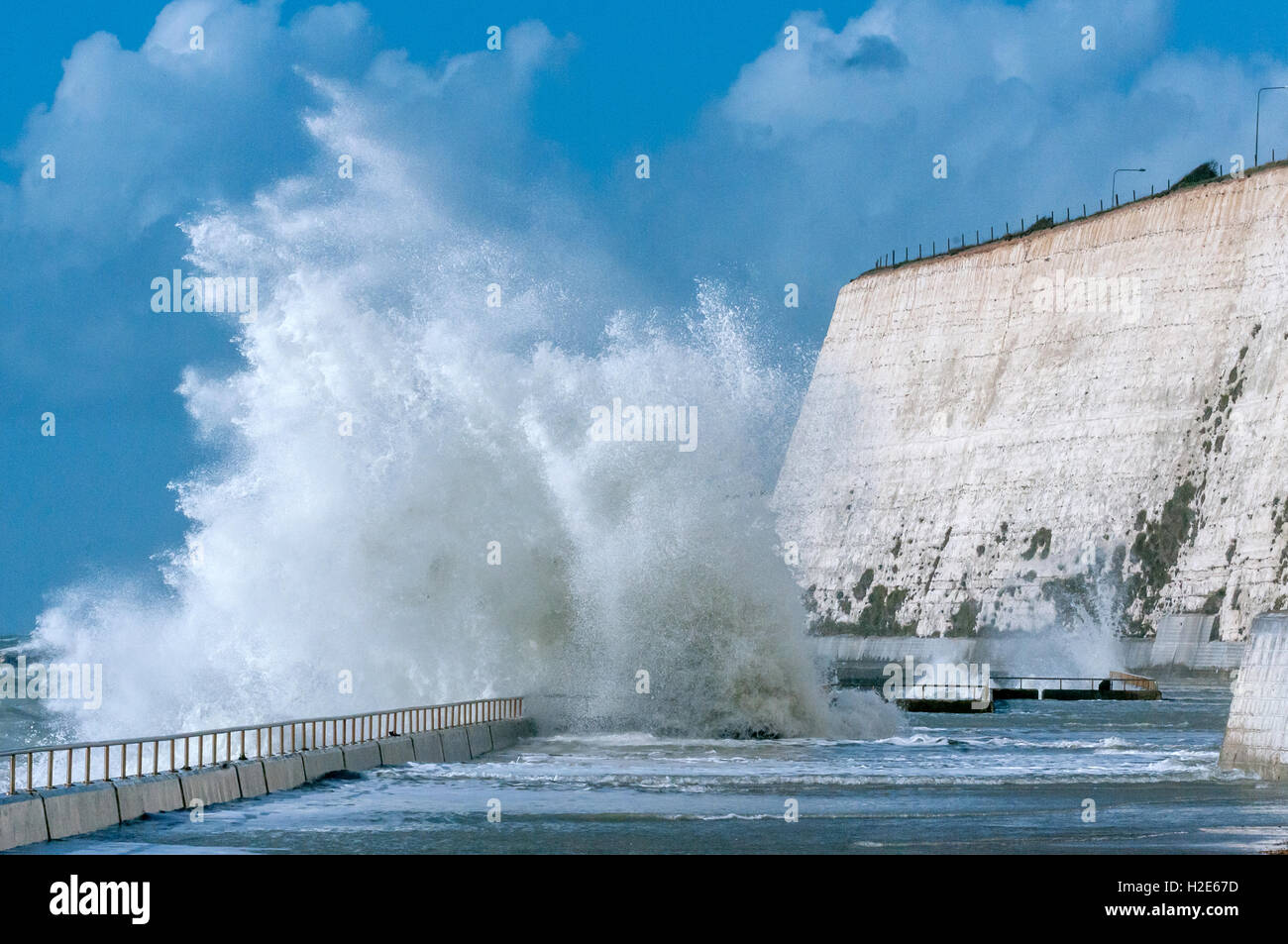 Waves crash against the sea wall at Saltdean Stock Photo - Alamy