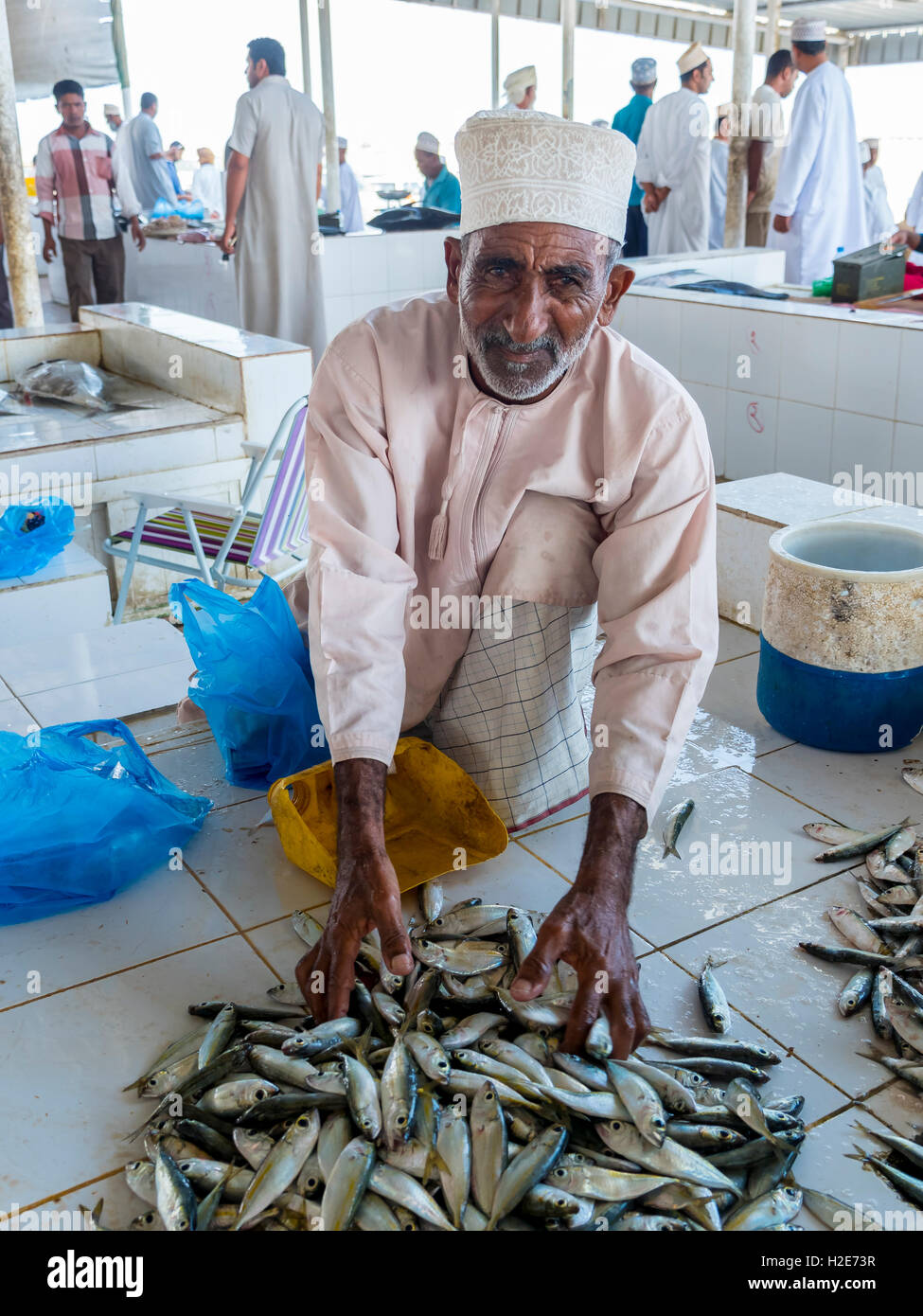 Merchant selling fresh fish, fish market, Barka, Oman Stock Photo - Alamy