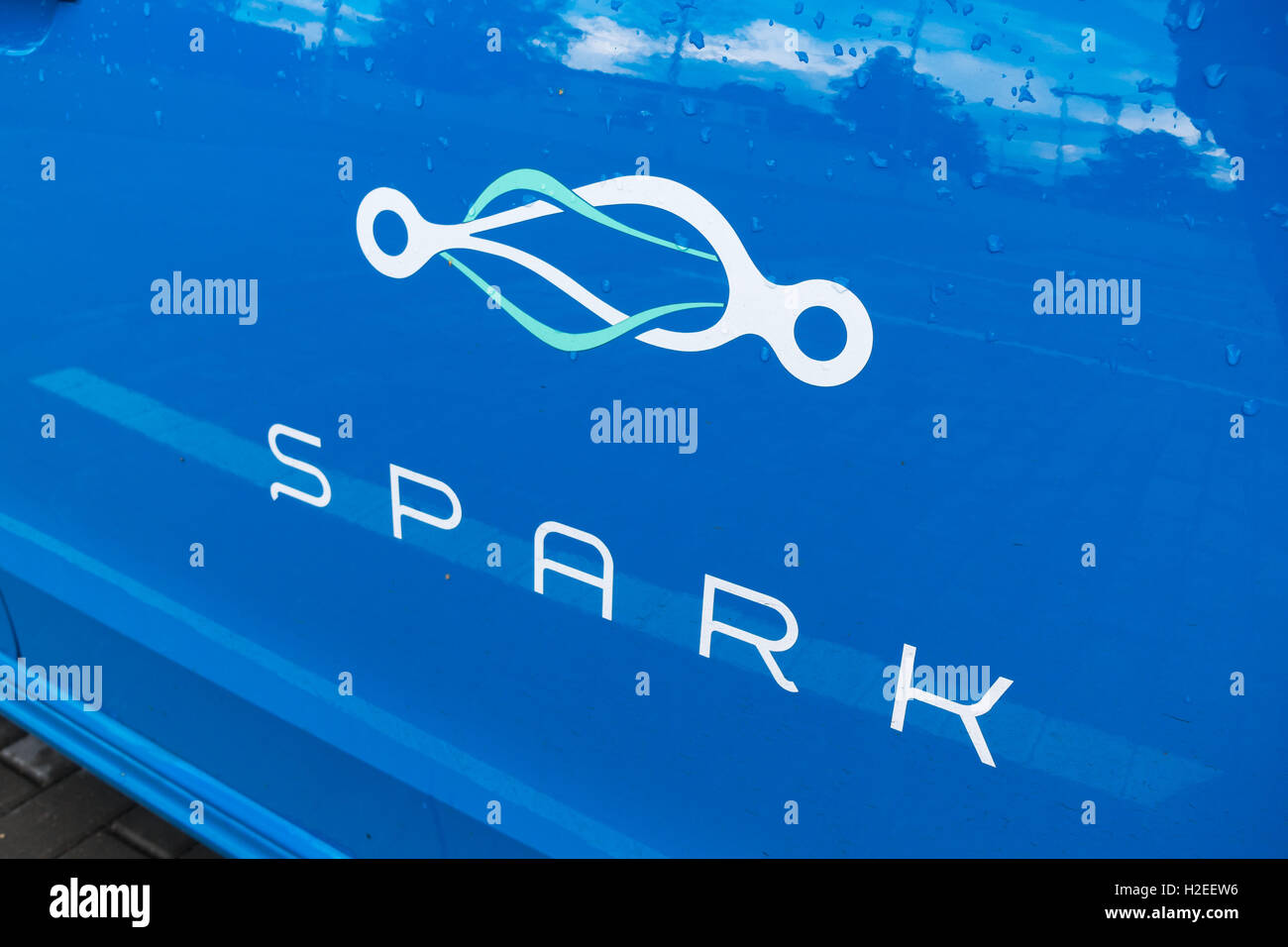 Volkswagen Spark electric car logo at day time Stock Photo - Alamy