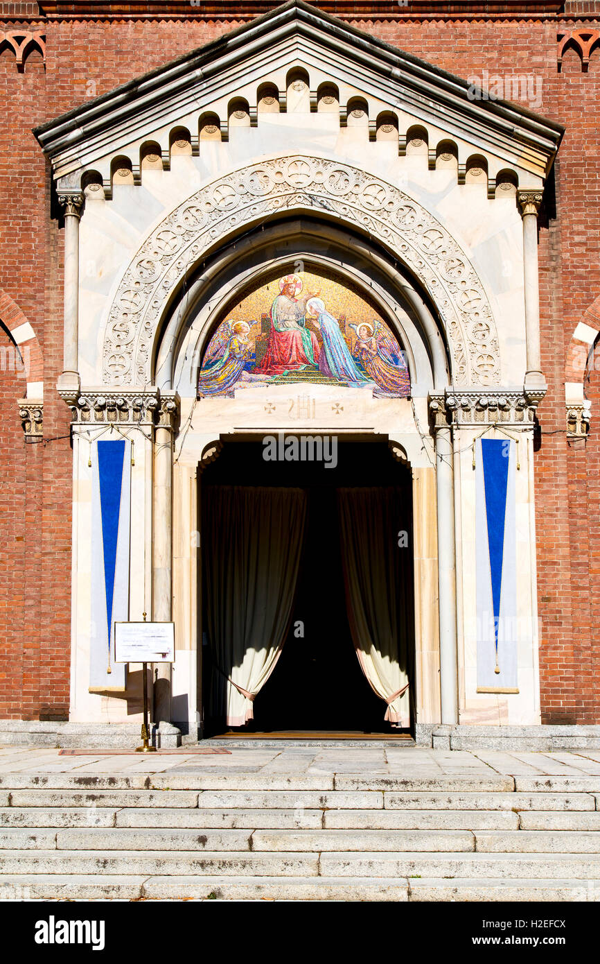 lombardy in the castellanza old church closed brick tower sidewalk ...
