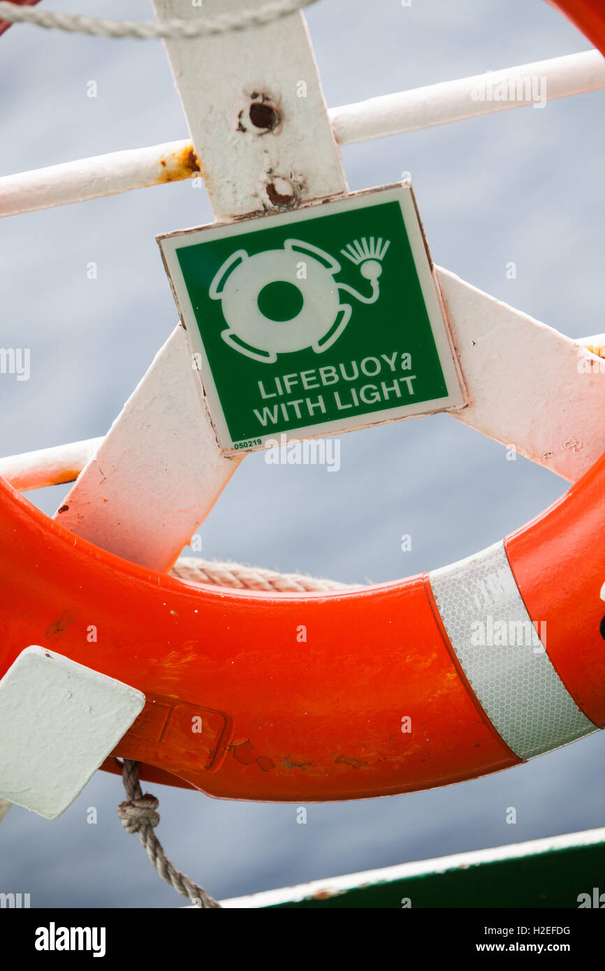 Color image of a lifebuoy on a boat Stock Photo - Alamy