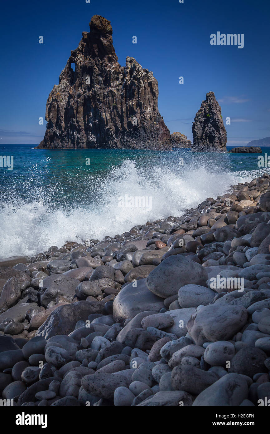 Stone beach at Ribeira da Janelo, Madeira, Portugal. huge volcanic ...