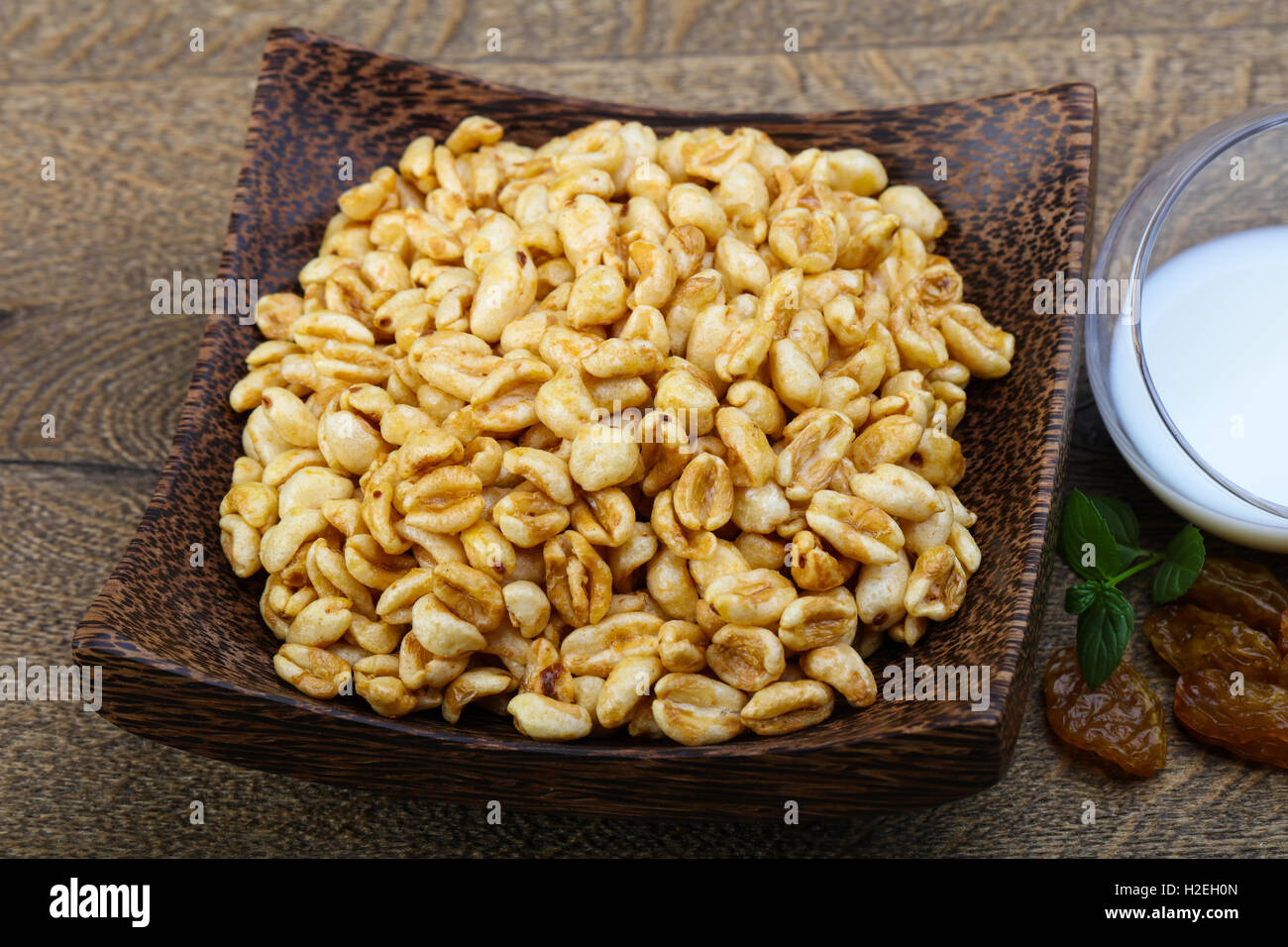 Rise flakes with milk, raisin and mint leaves Stock Photo - Alamy