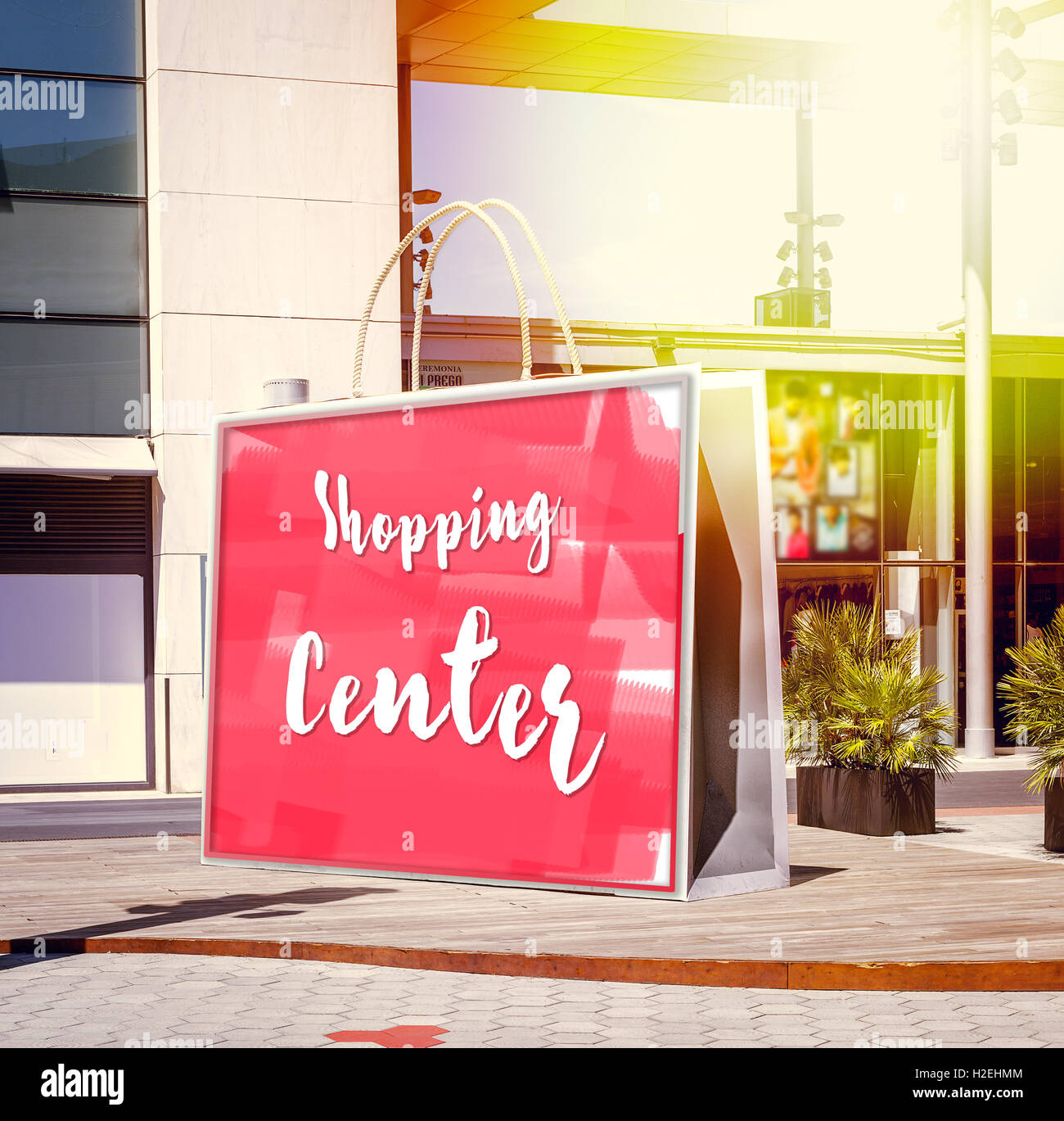 Bright advertising billboard with sign "Shopping center" in the form of ...