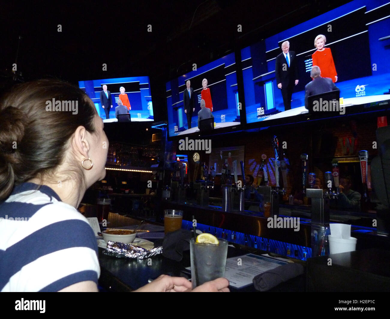 Denver, USA. 27th Sep, 2016. People watch the the U.S. presidential ...