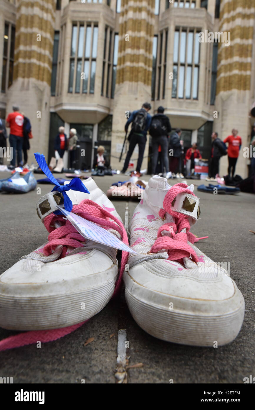 Whitehall, London, UK. 27th September 2016. Empty shoes representing ...