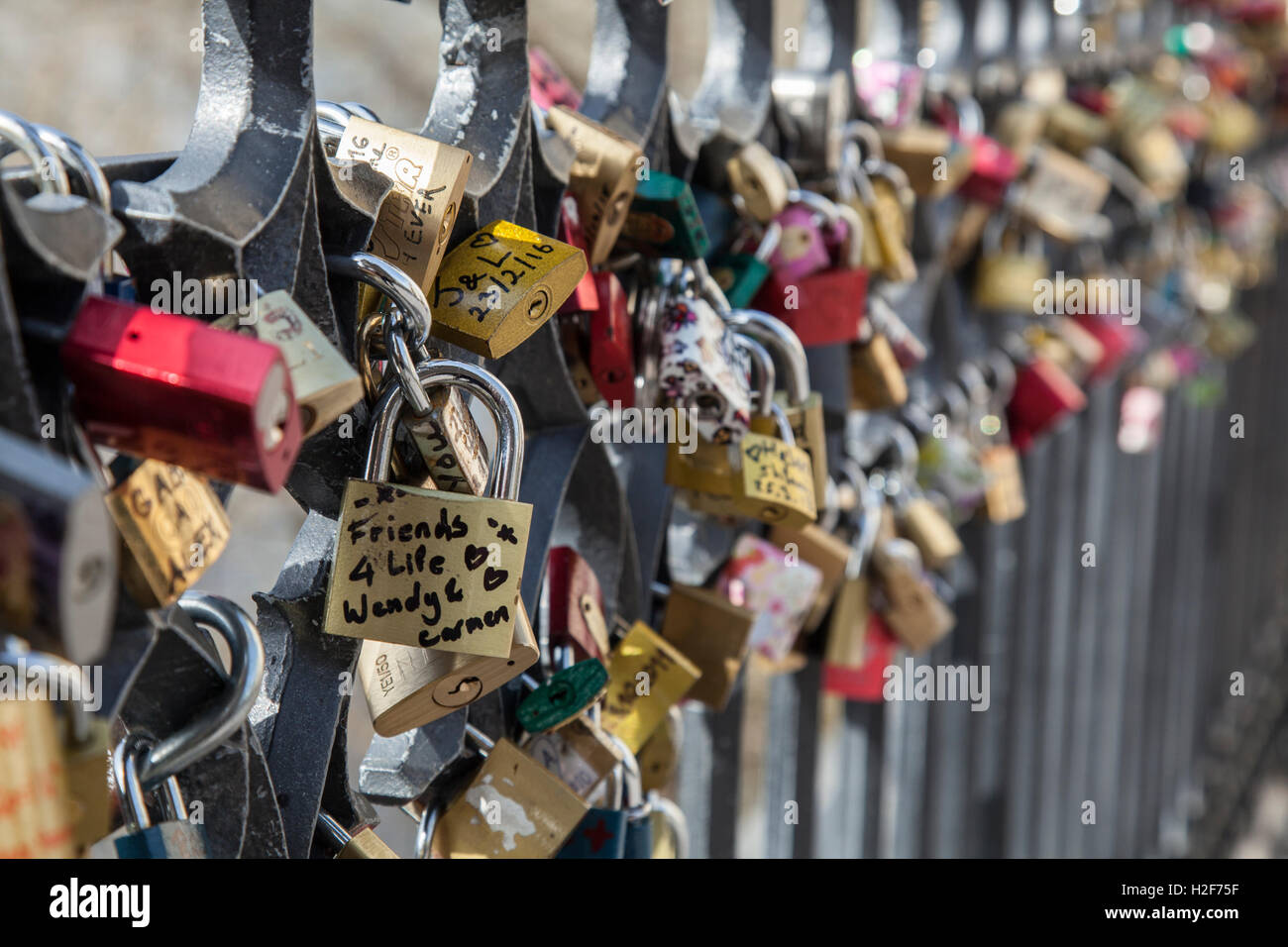 Love locks on railings next to Charles Bridge Prague Stock Photo - Alamy