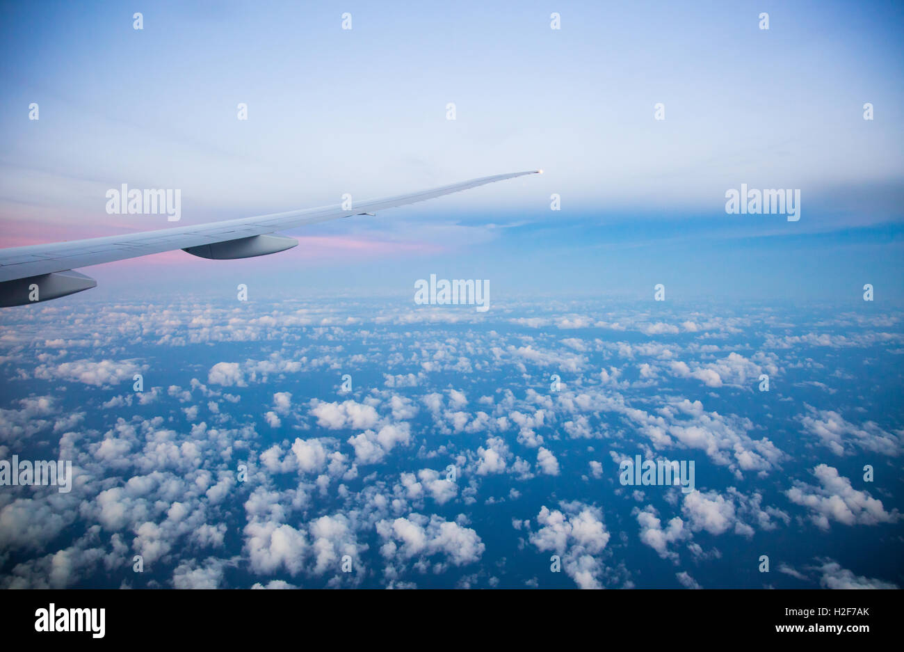 Airplane flying dramatic sunset sky hi-res stock photography and images ...
