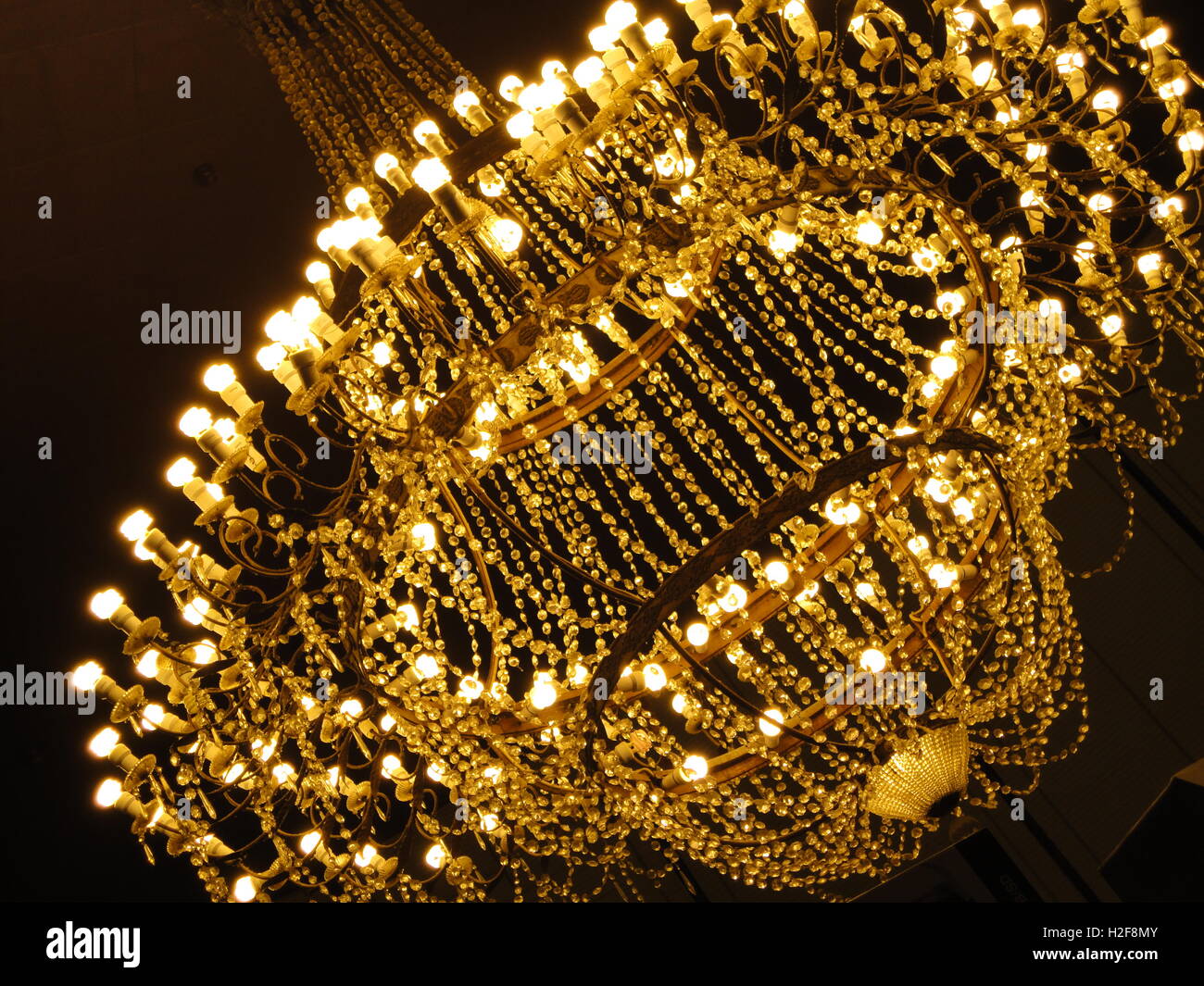 a beautiful chandelier on dark background Stock Photo - Alamy