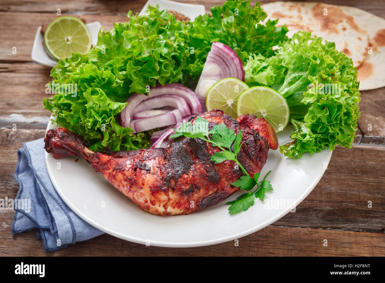 Indian tandoori chicken leg hi-res stock photography and images - Alamy