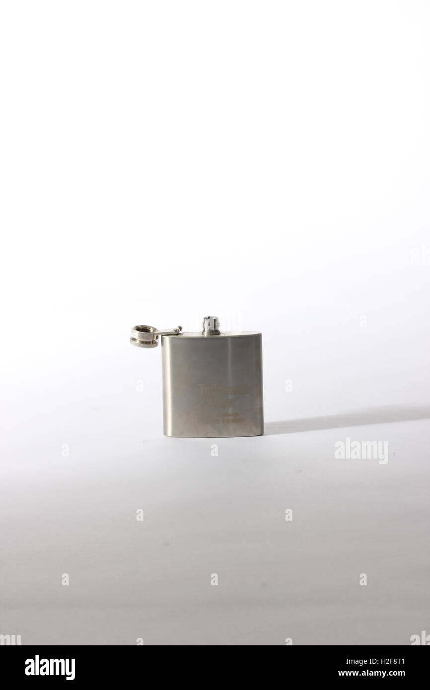 metal whiskey flask on white background Stock Photo - Alamy