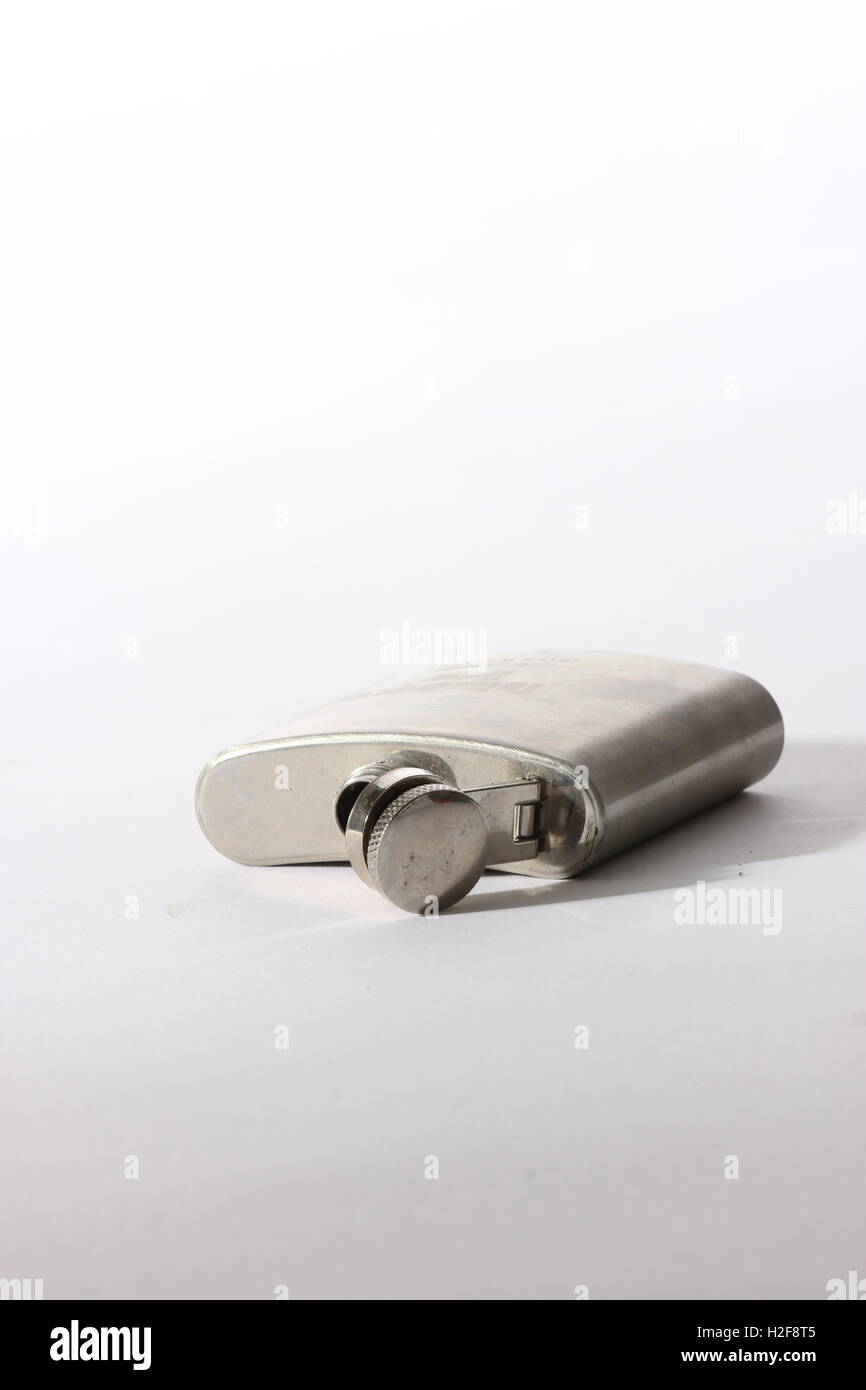 metal whiskey flask on white background Stock Photo - Alamy