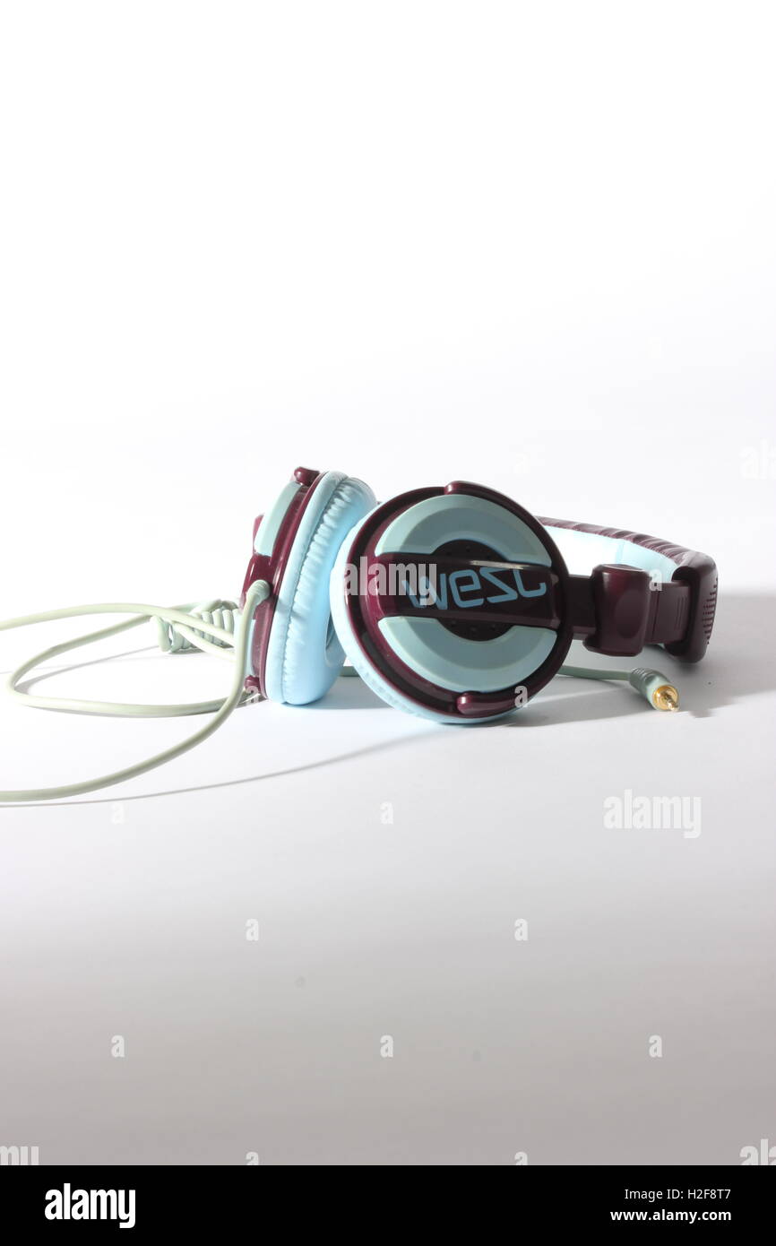 White earphones on purple background hi-res stock photography and ...