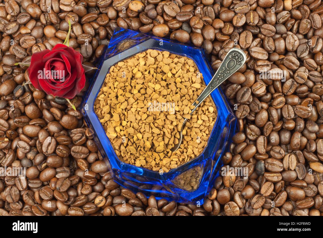 Granules of instant coffee background. Instant coffee in a glass dish ...