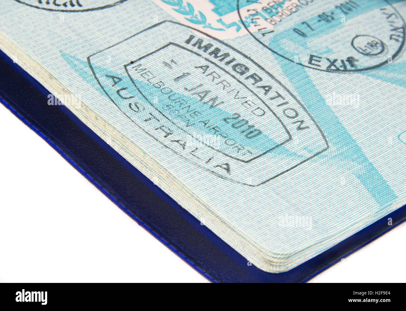 visa stamps in open passport page Stock Photo - Alamy