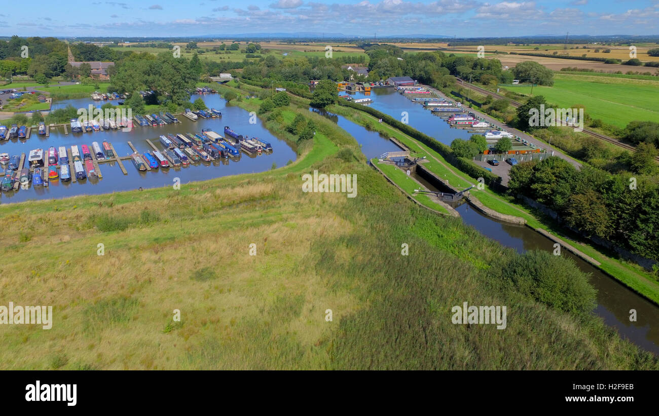 Aerial view of Rufford canal basin, narrow boats, lock and railway ...