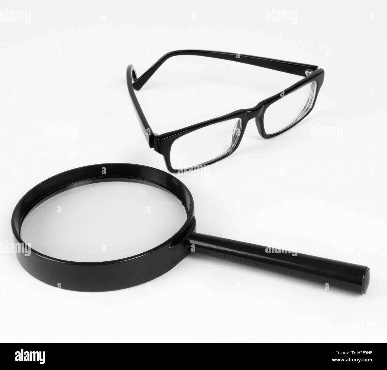 magnifying glass with glasses Stock Photo - Alamy