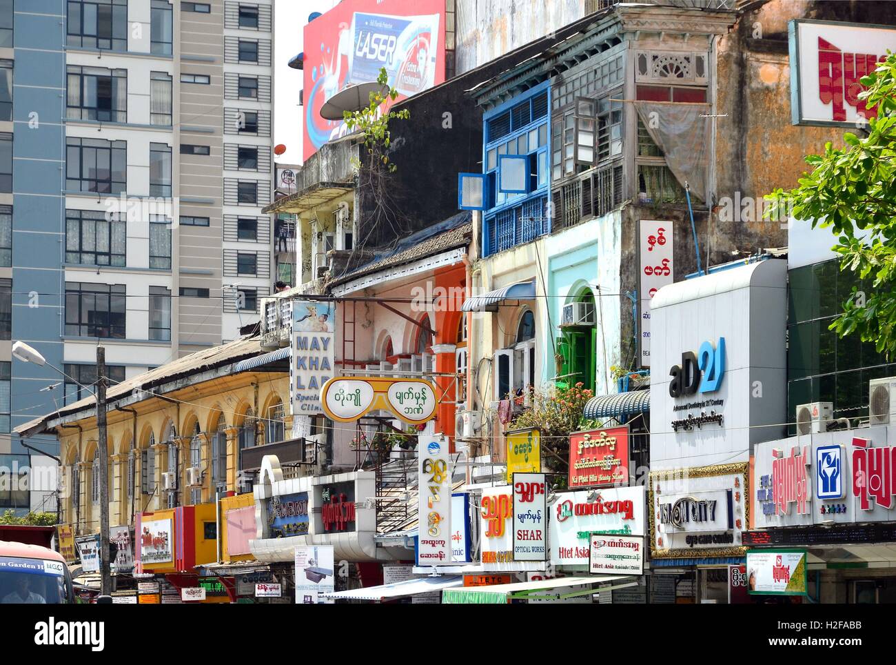Yangon, Myanmar - March 9, 2015: A street archtecture view with ...