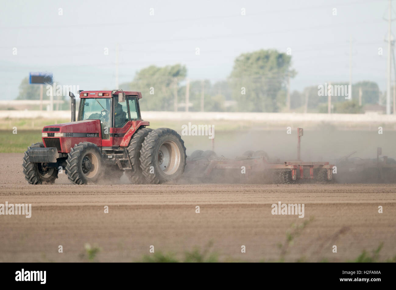 Case 8940 pulling Brillion farm equipment Stock Photo - Alamy