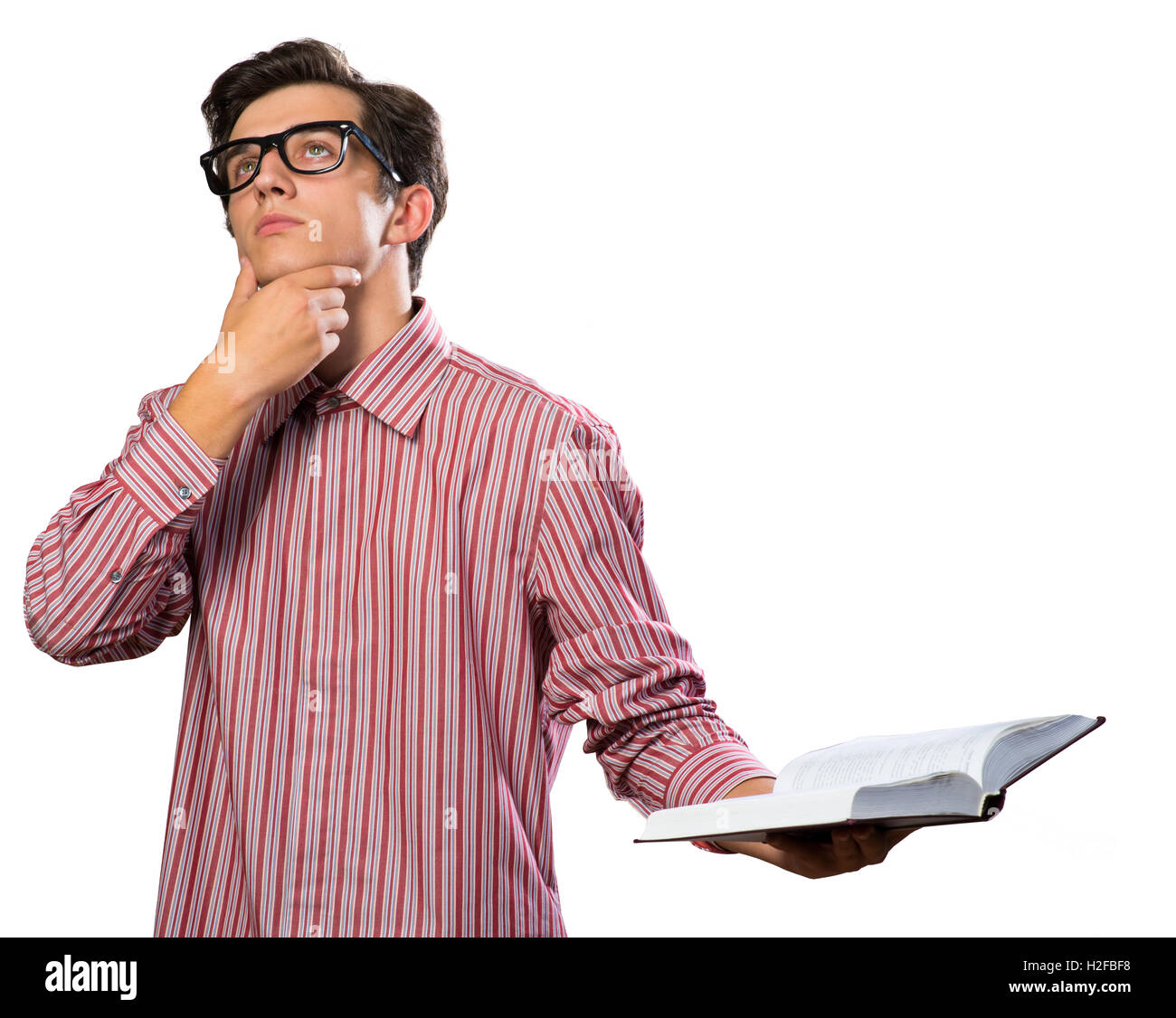 Confused man reading book Cut Out Stock Images & Pictures - Alamy