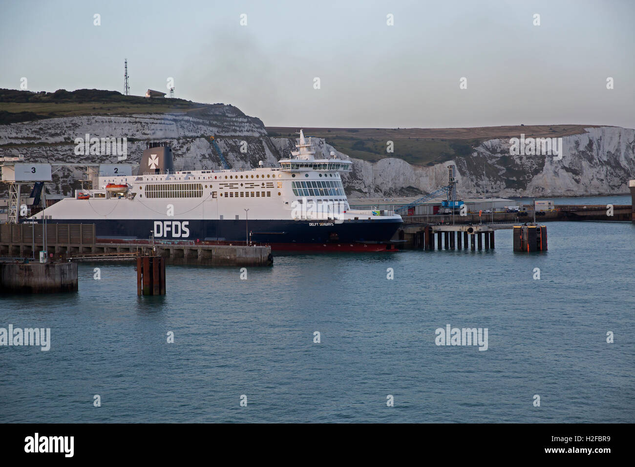 A view of the white cliffs of Dover in the UK with the port below them ...