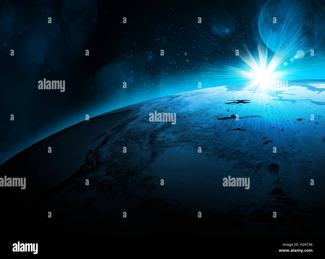 Earth planet in sun rays Stock Photo - Alamy