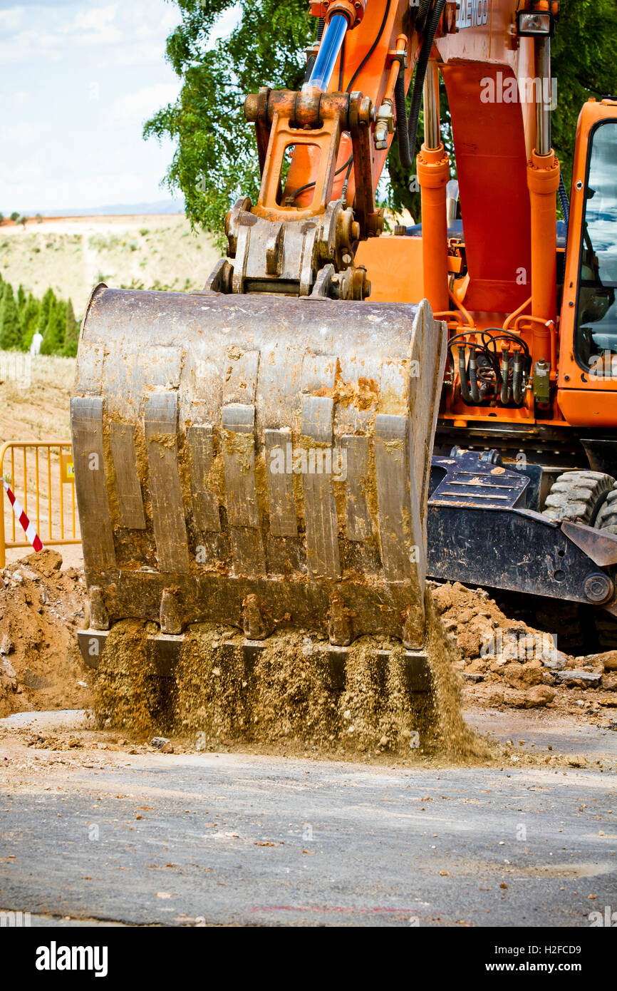 excavator loader machine during earthmoving works outdoors at co Stock ...