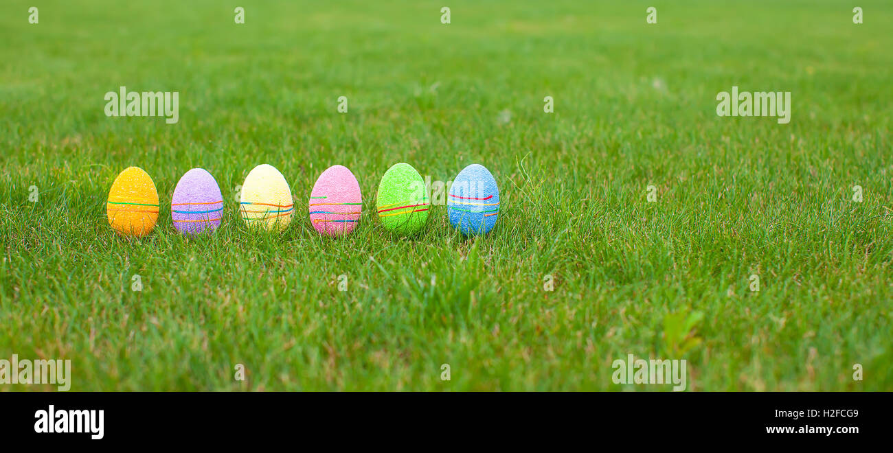Colored colorful easter eggs in the grass Stock Photo - Alamy