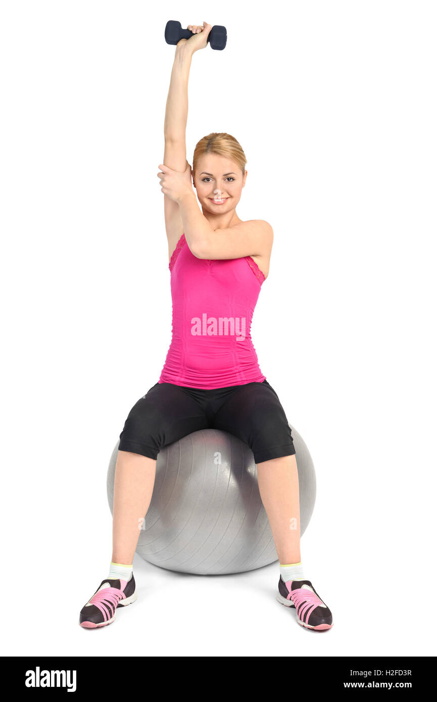 Seated Dumbbell One Arm Triceps Extensions on Fitnes Ball, phase Stock ...