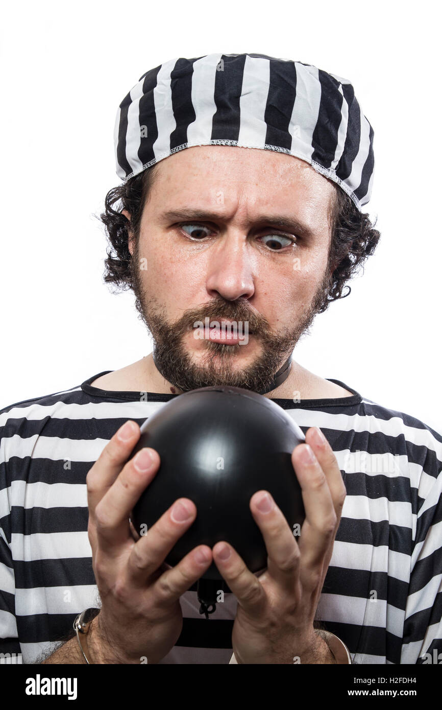 Funny man prisoner criminal with chain ball and handcuffs in stu Stock ...