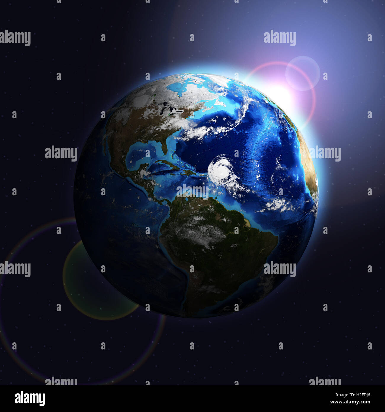 Earth planet in sun rays Stock Photo - Alamy