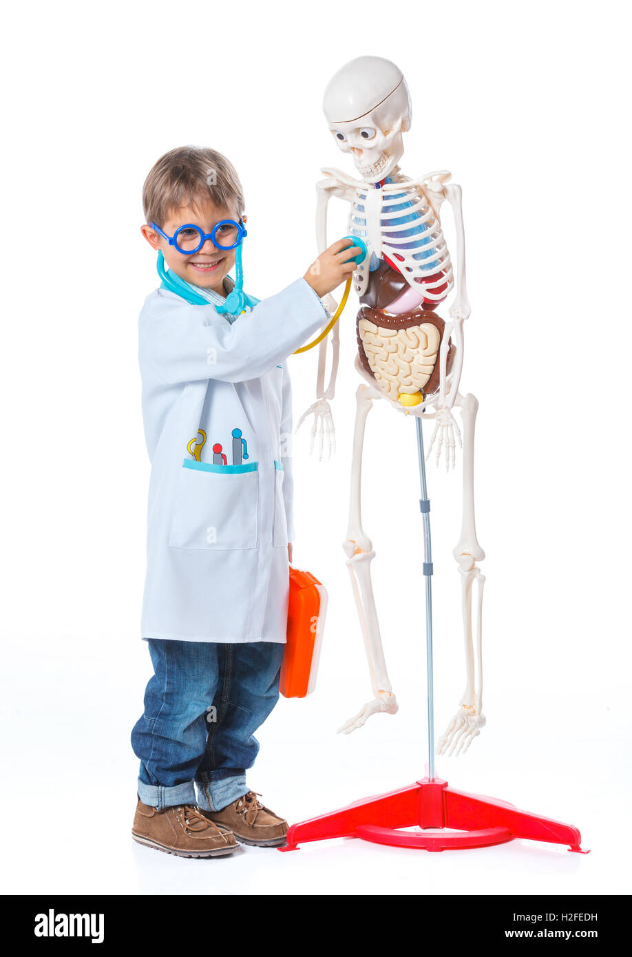Boy playing doctor Cut Out Stock Images & Pictures - Alamy