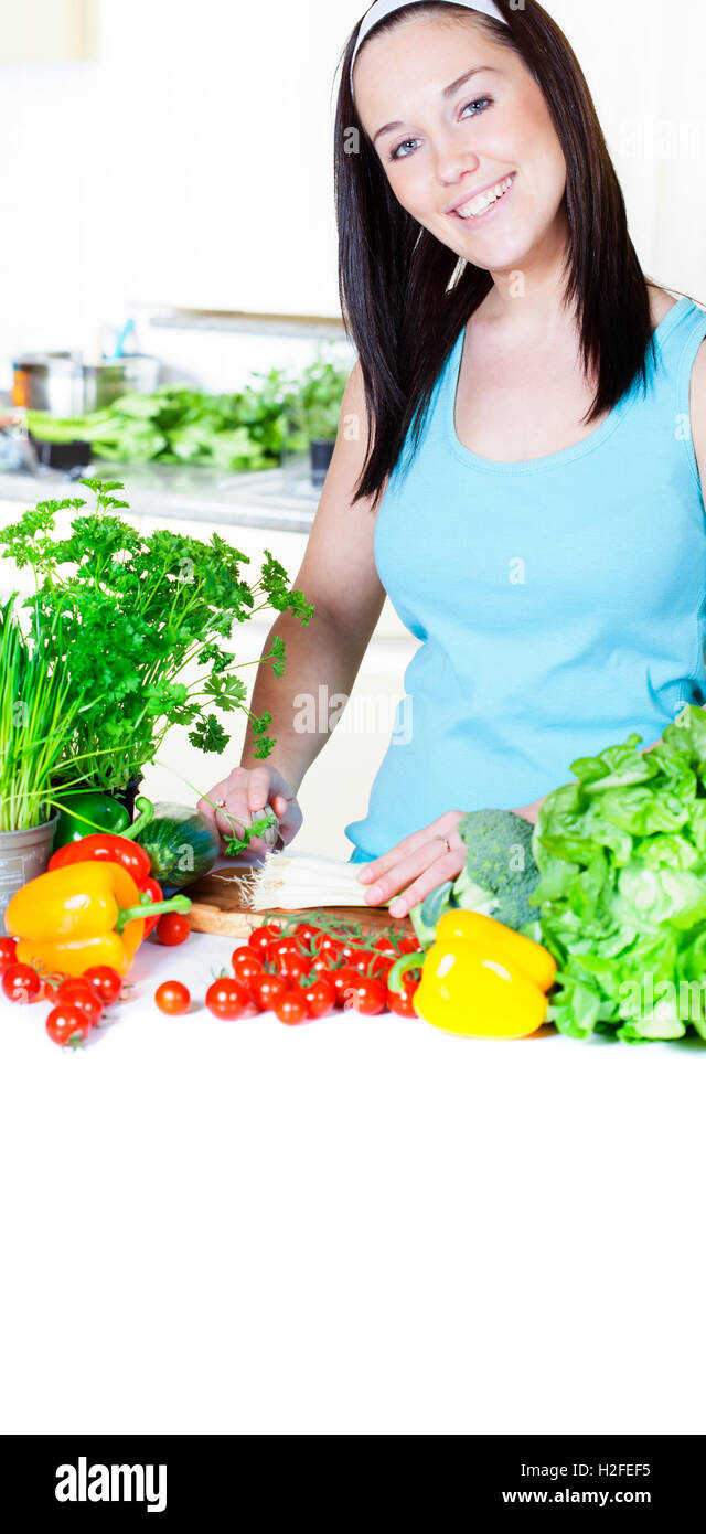 Young Woman Cooking Stock Photo - Alamy