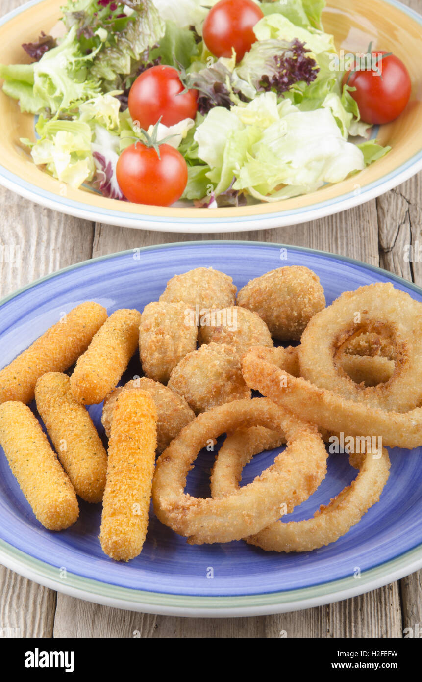 fried snack on a blue plate Stock Photo - Alamy