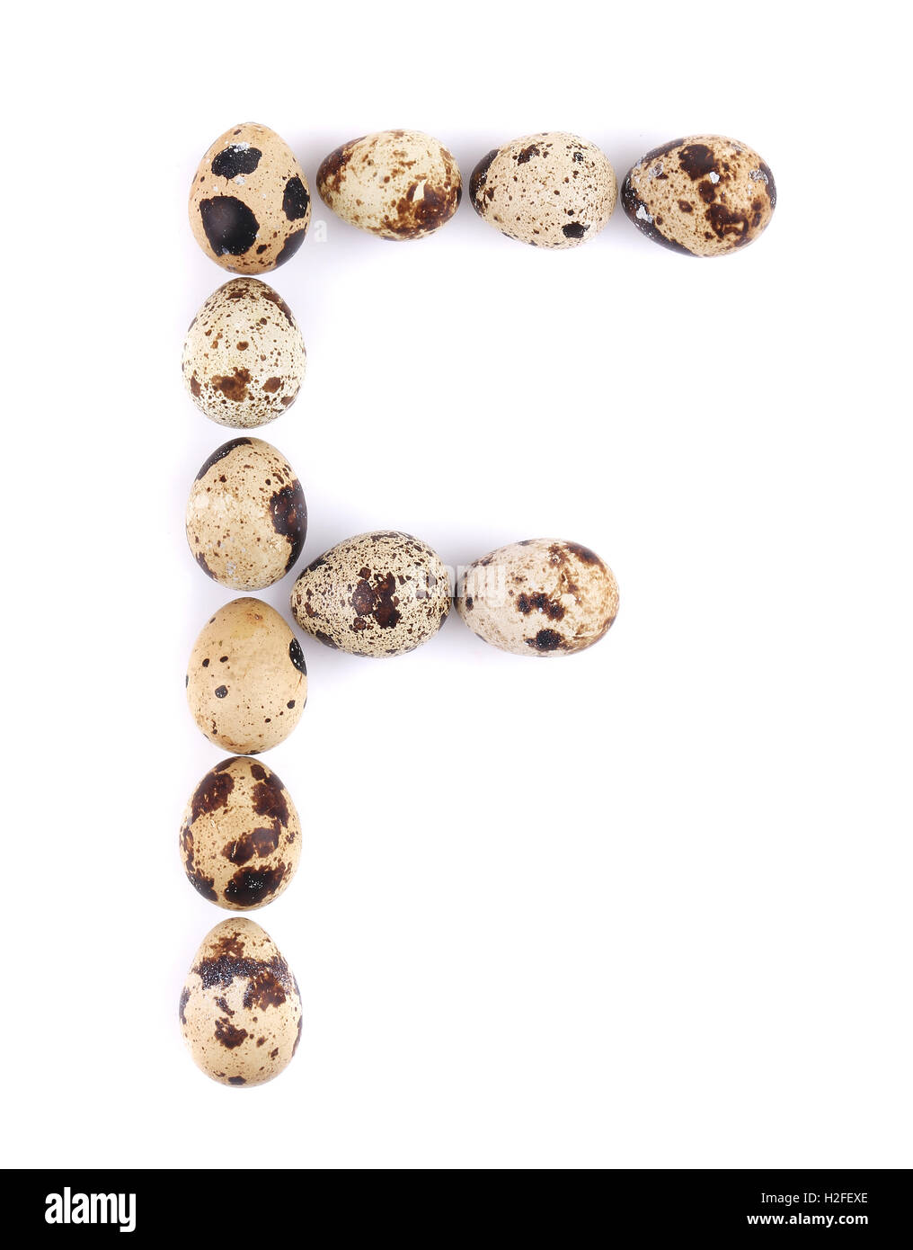 quail eggs in the form of letter F Stock Photo - Alamy