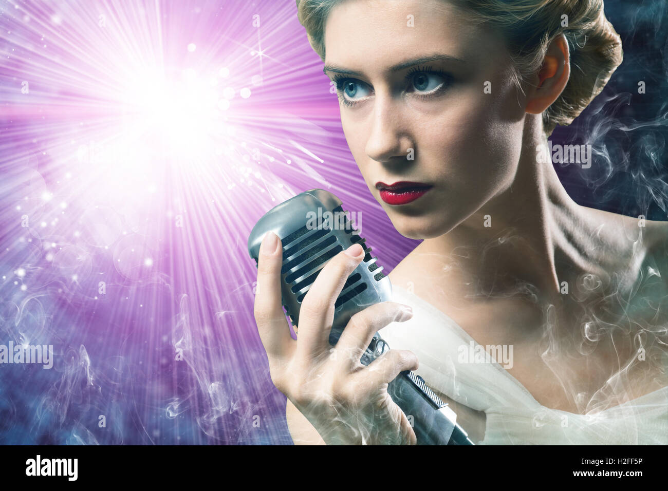 attractive female singer with microphone Stock Photo - Alamy