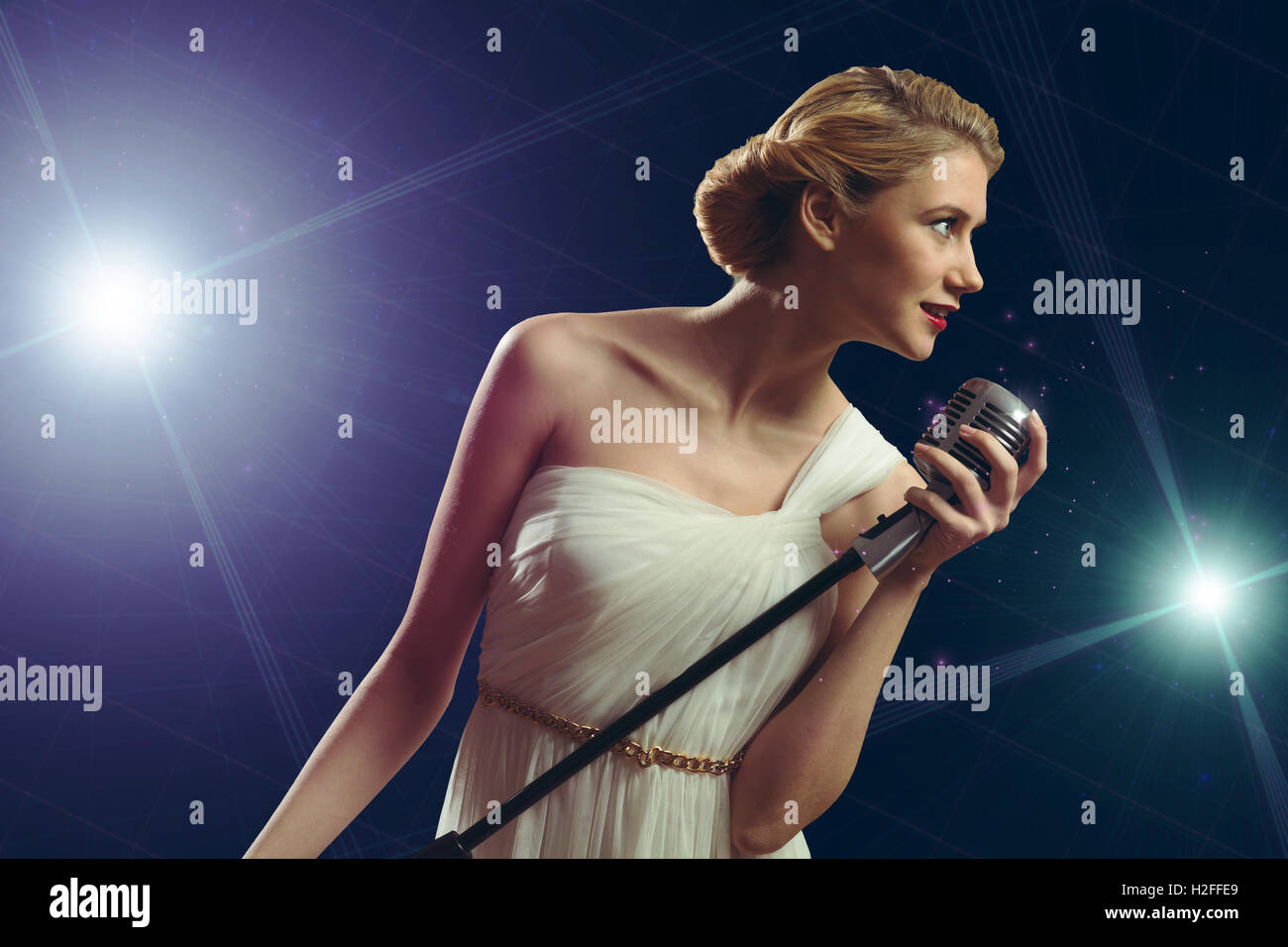 attractive female singer with microphone Stock Photo - Alamy