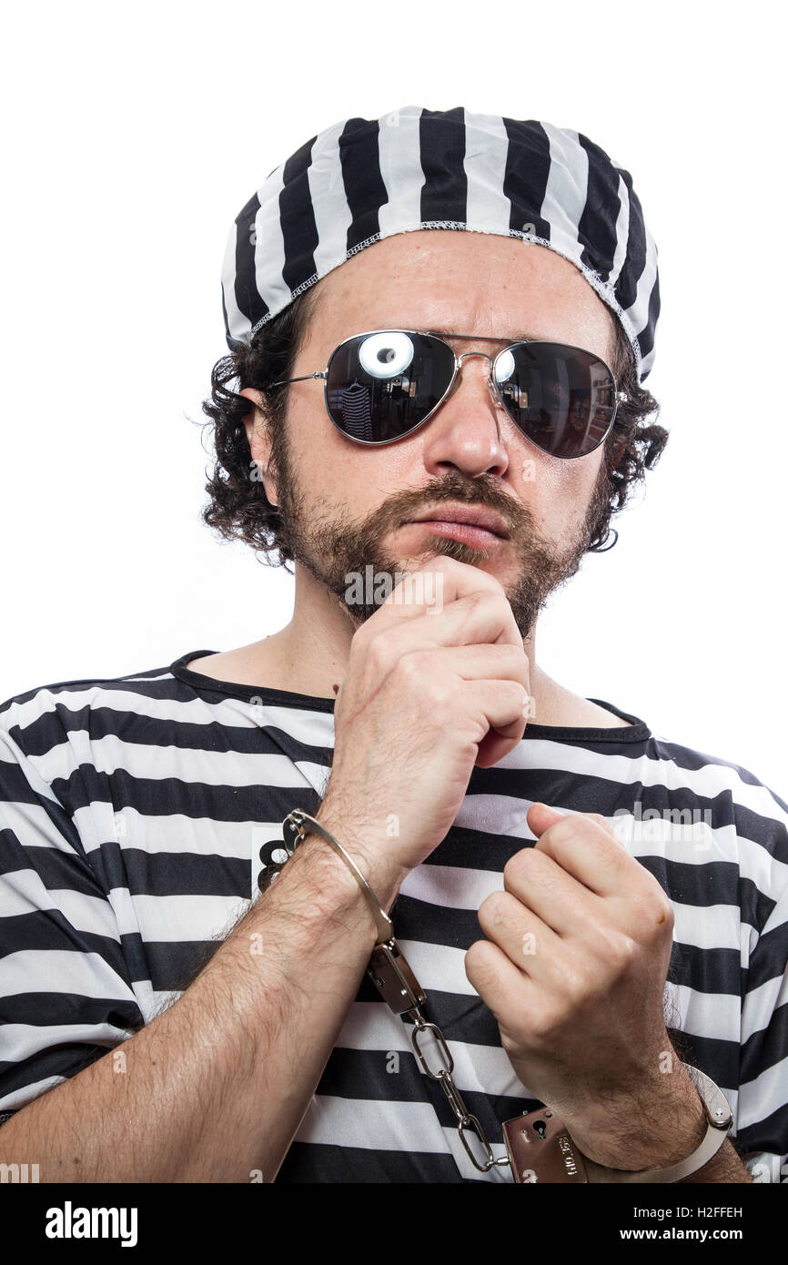 Depressed prisoner behind bars hi-res stock photography and images - Alamy