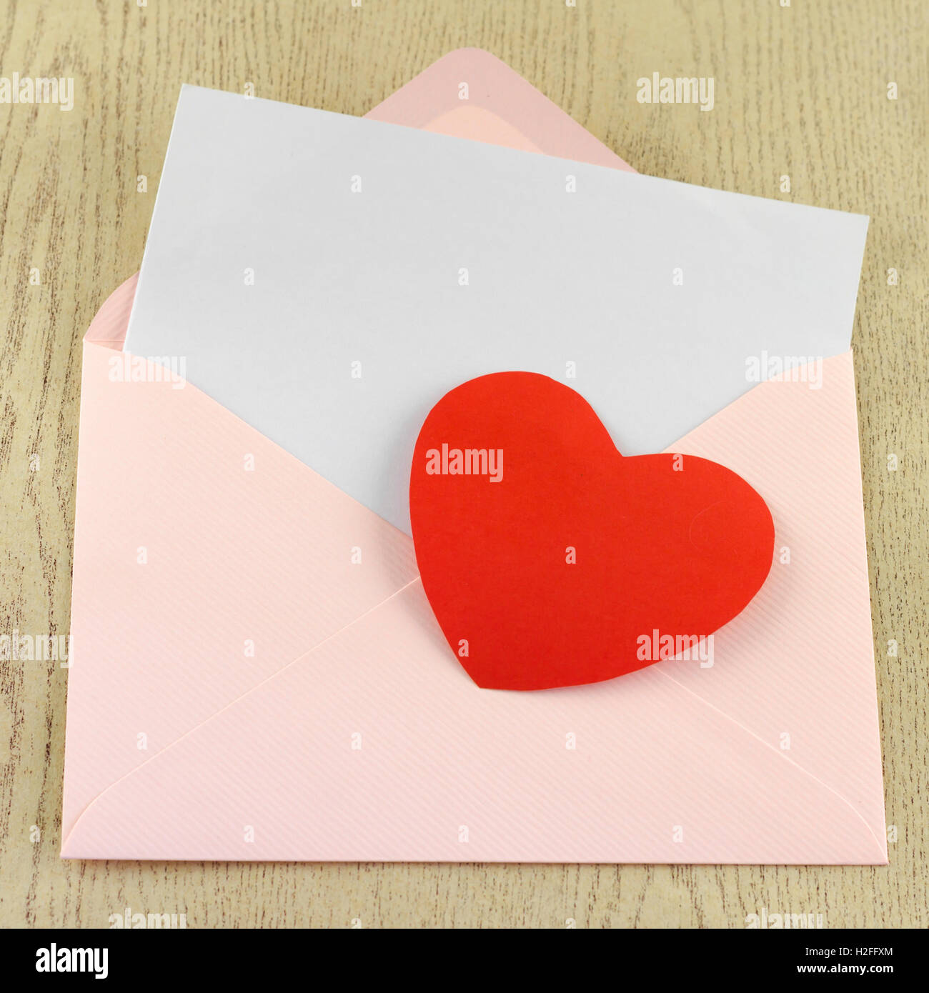 red heart with pink envelope Stock Photo - Alamy