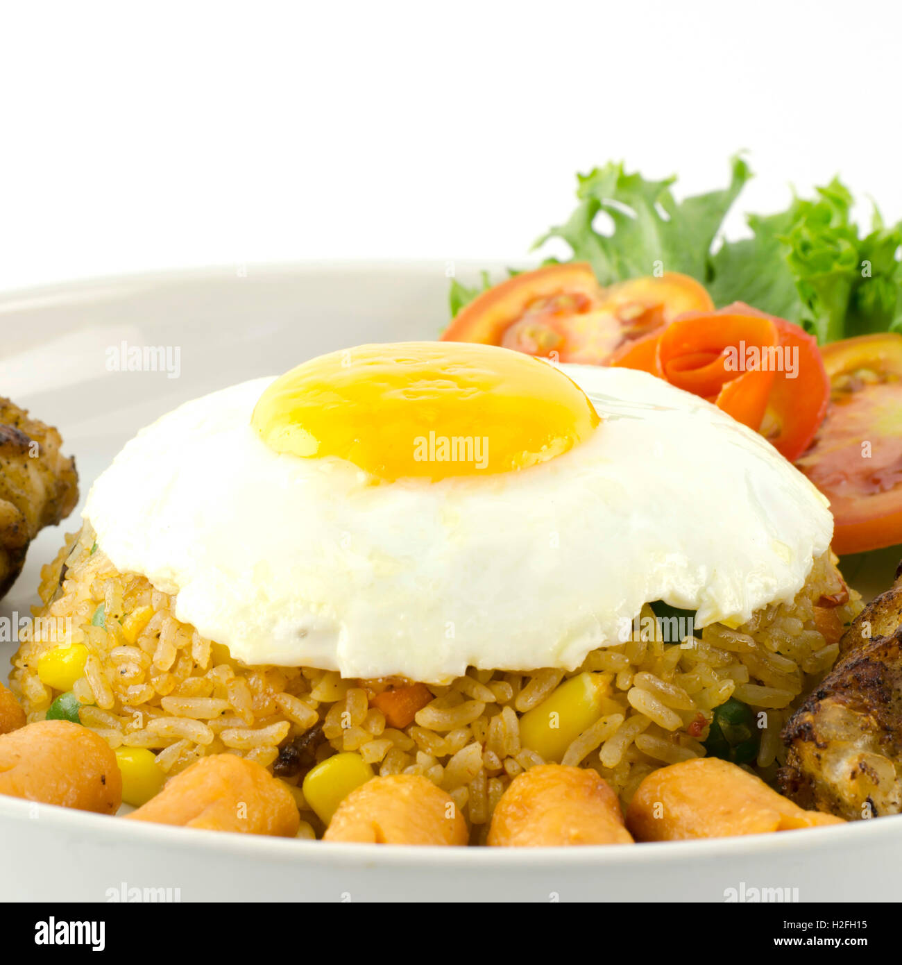 American fried rice isolated on white Stock Photo - Alamy