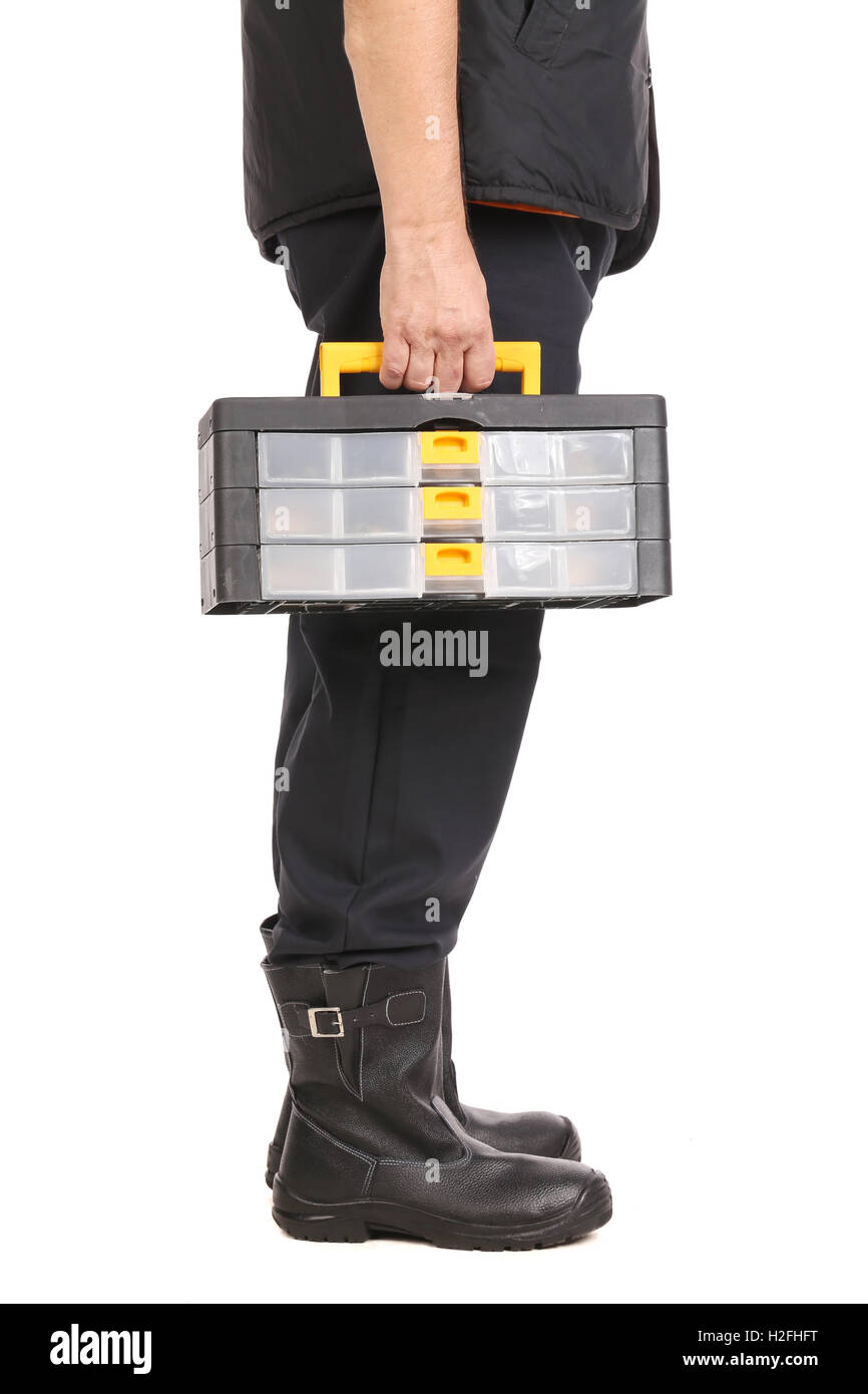 Set of tools for the builder in hand Stock Photo - Alamy