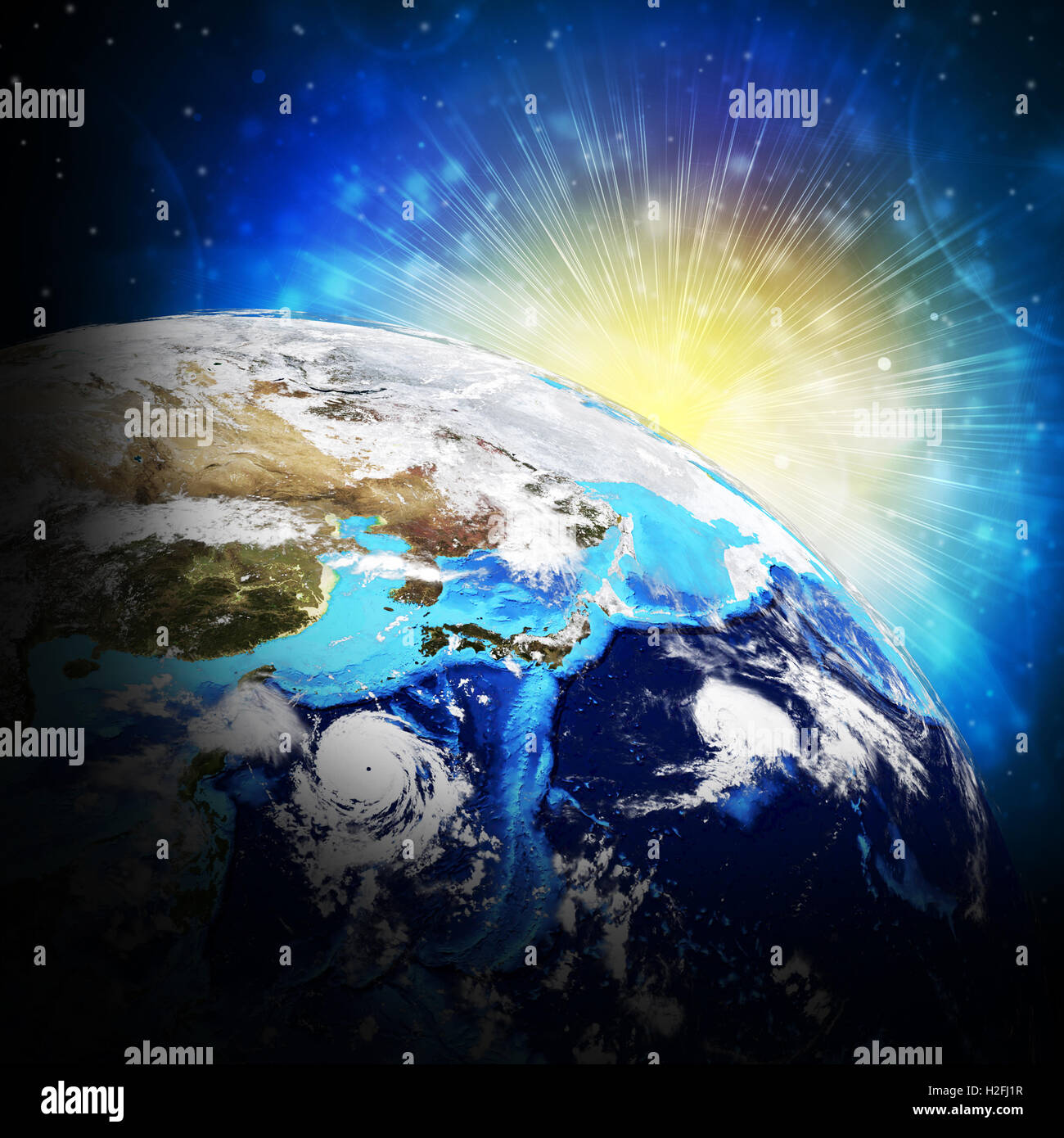 Earth planet in sun rays Stock Photo - Alamy