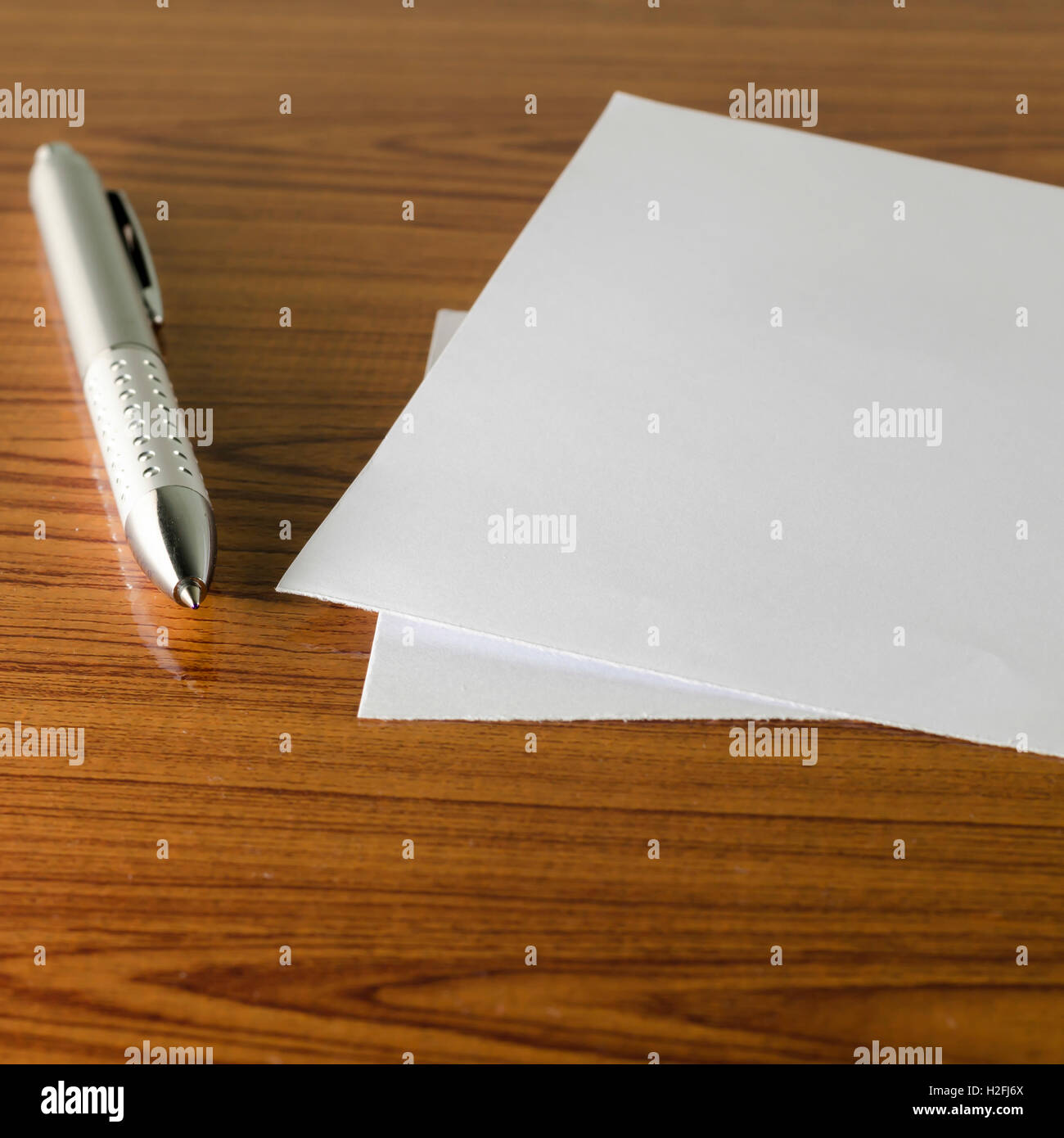 pen with white paper Stock Photo - Alamy