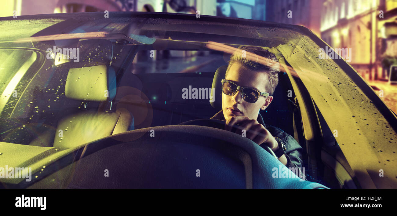 Man driving car at night rain hi-res stock photography and images - Alamy