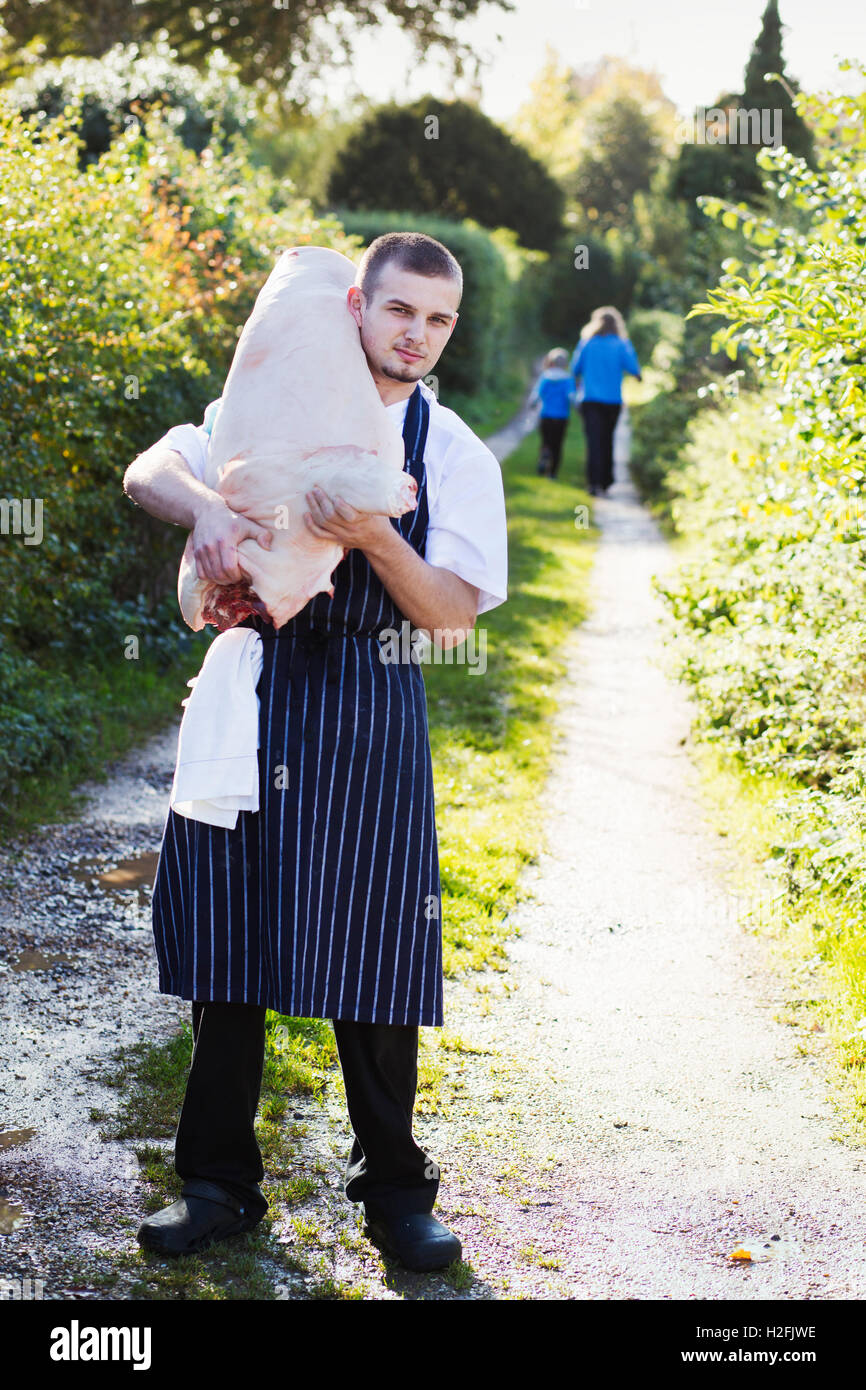 Adult carrying carcass hi-res stock photography and images - Alamy