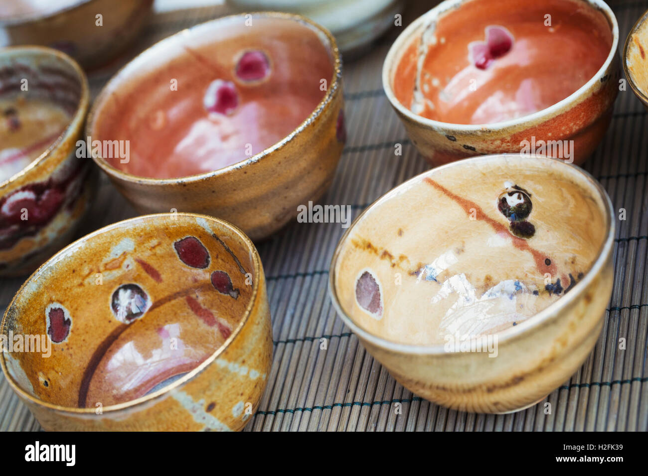 Fired ceramic bowls with design and a variety of finishes and colours ...
